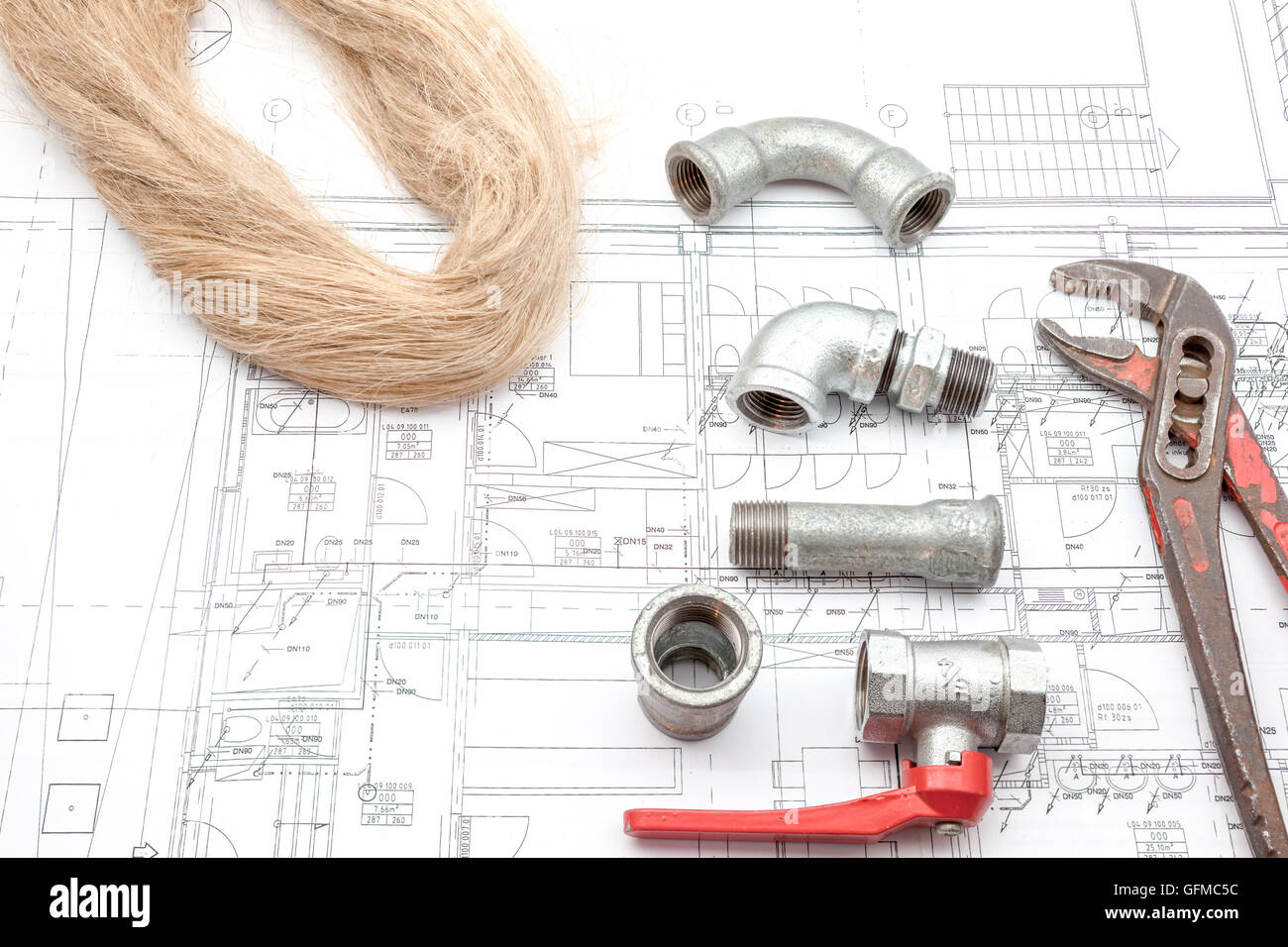 Plumbing Tools Arranged On House Plans whit wrench and water valves ...