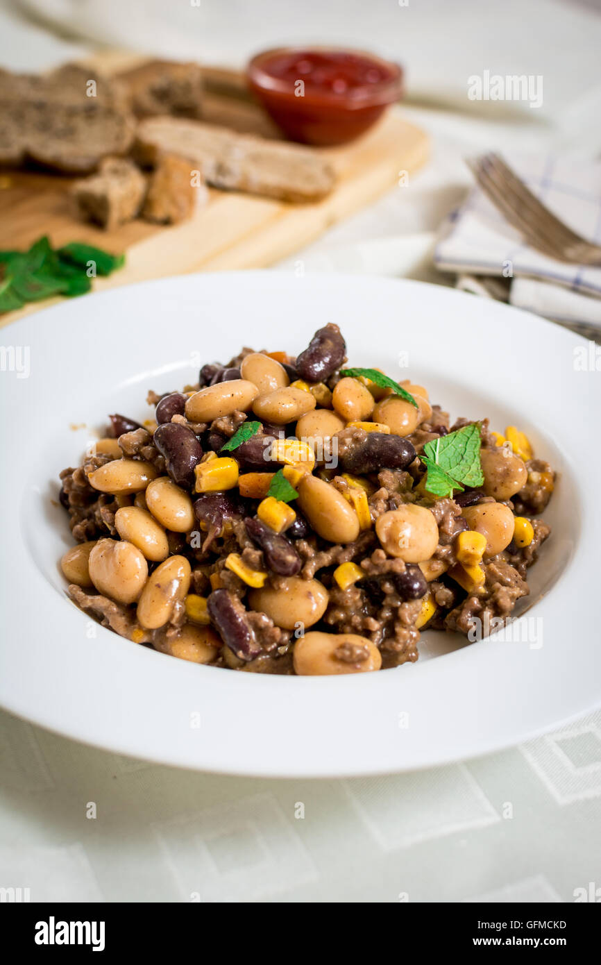 Traditional cuisine chili con carne with beef meat Stock Photo - Alamy