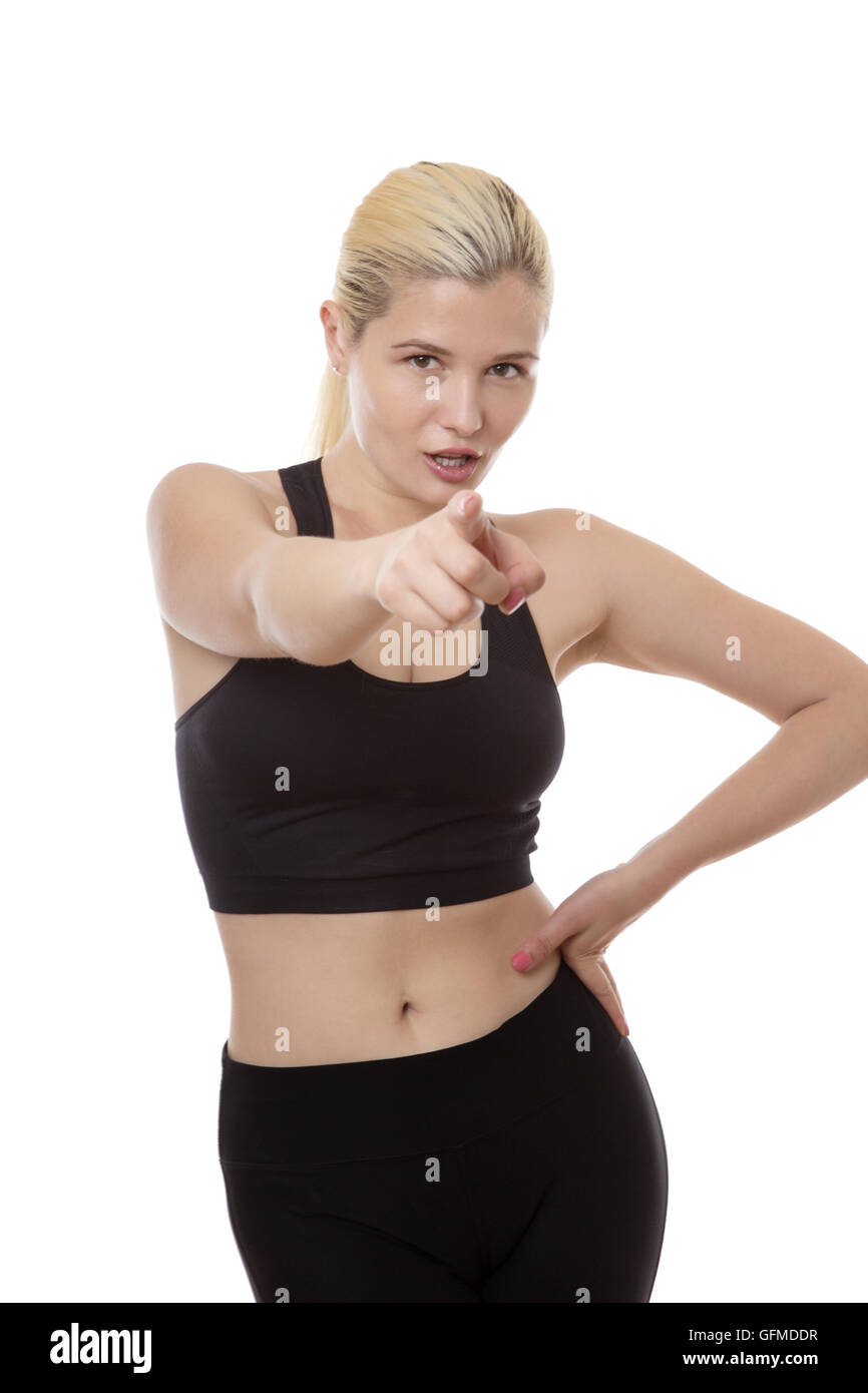 Fitness woman pointing with her finger at you Stock Photo - Alamy