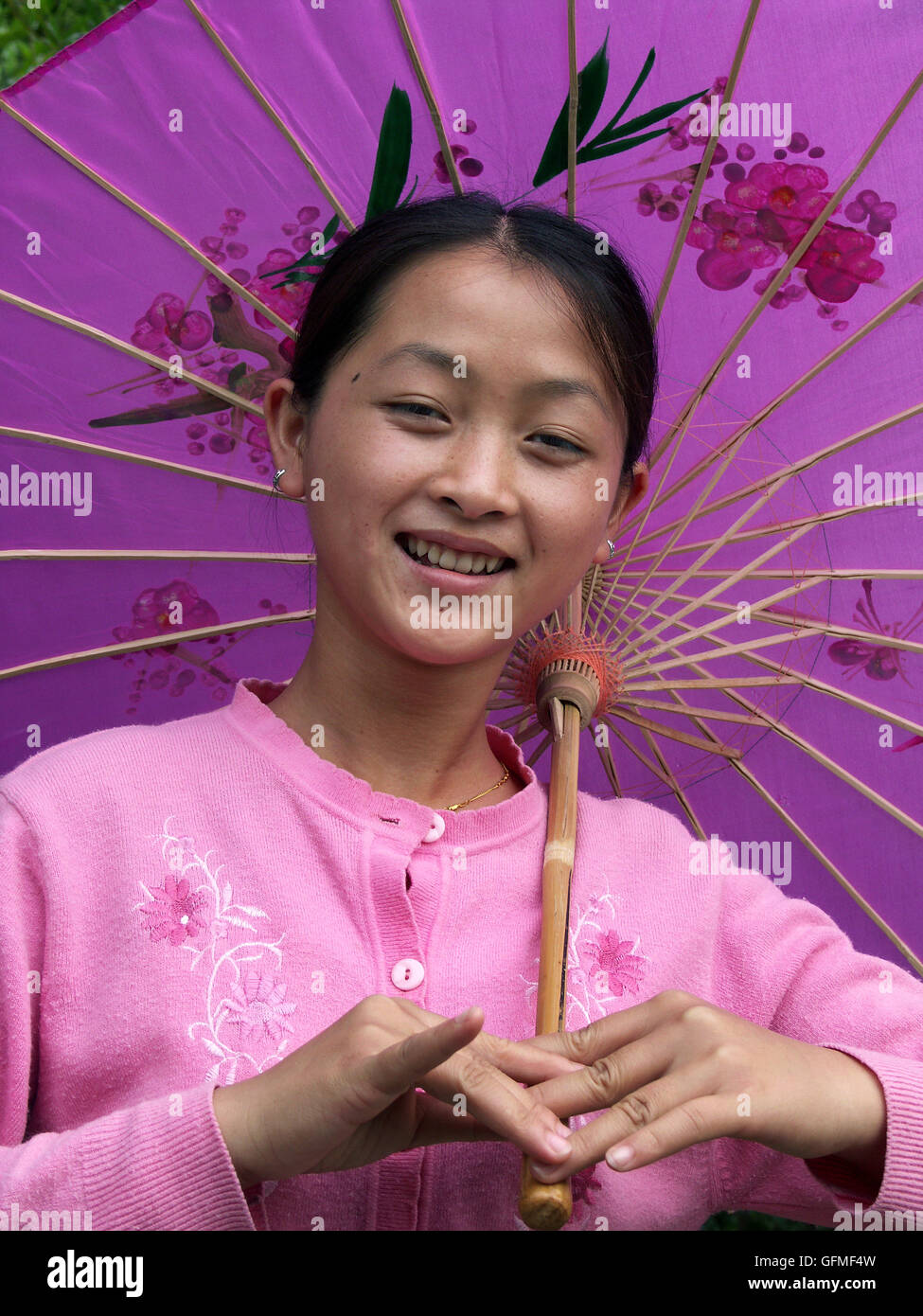 A Dai girl with parasol in the Chinese Ethnic Culture Park, Beijing ...