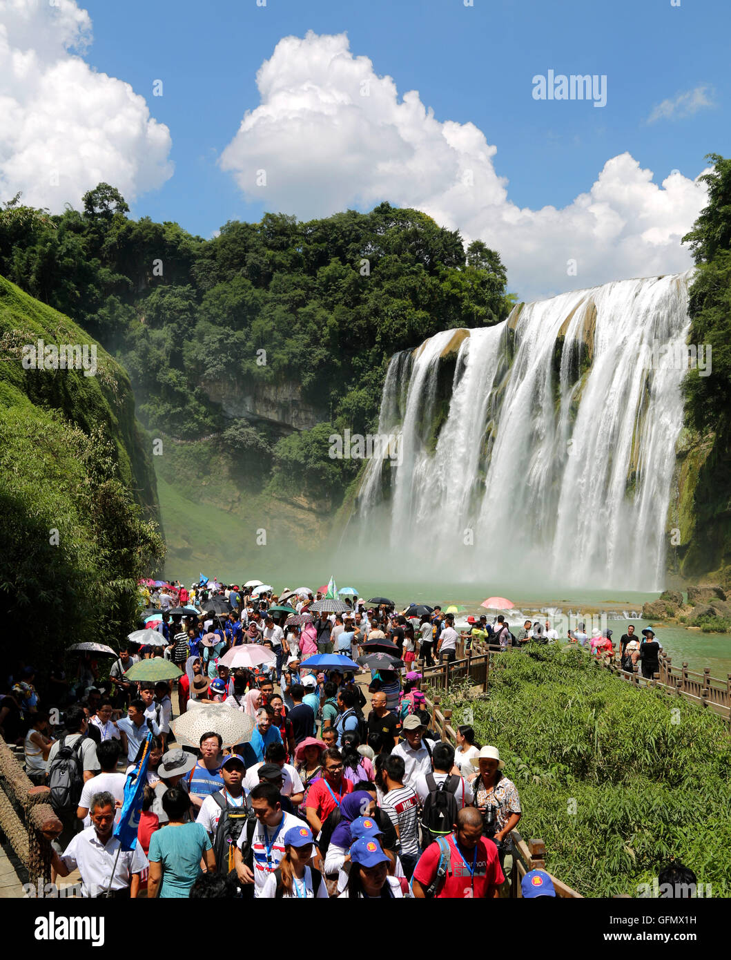 Anshun, China's Guizhou Province. 31st July, 2016. People visit the ...