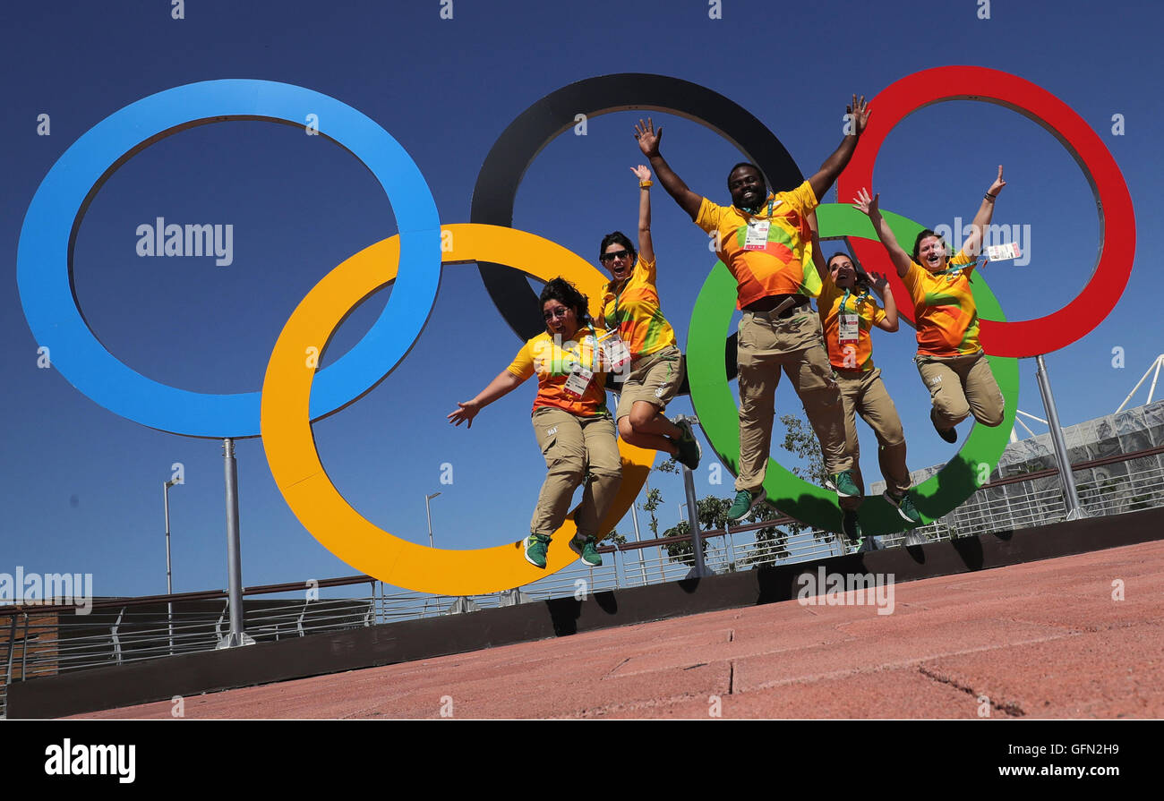 Rio de Janeiro, Brazil. 1st Aug, 2016. Volunteers jump in the air in ...