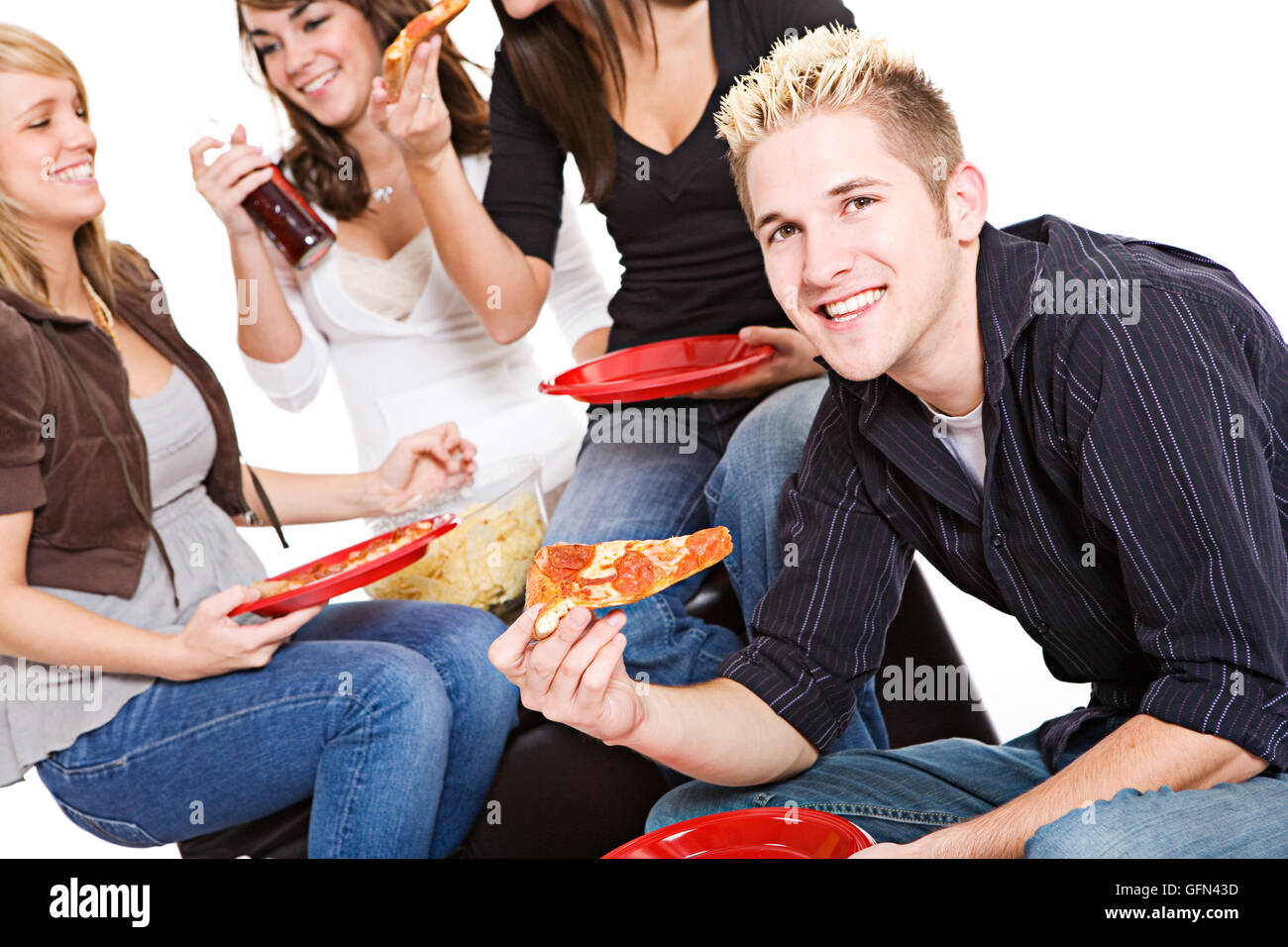 Group of friends, hanging out, eating pizza and studying Stock Photo ...