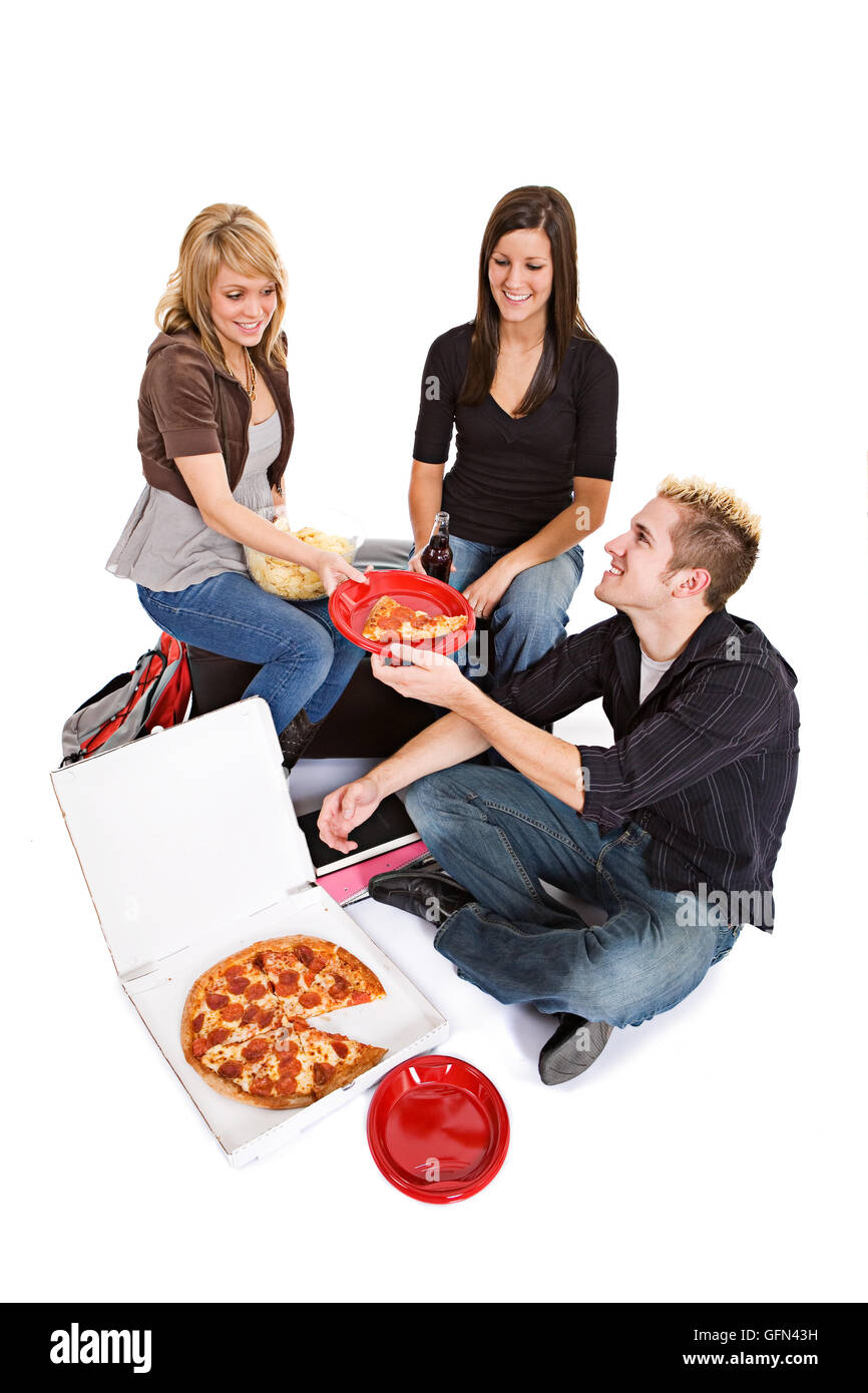 Group of friends, hanging out, eating pizza and studying Stock Photo ...