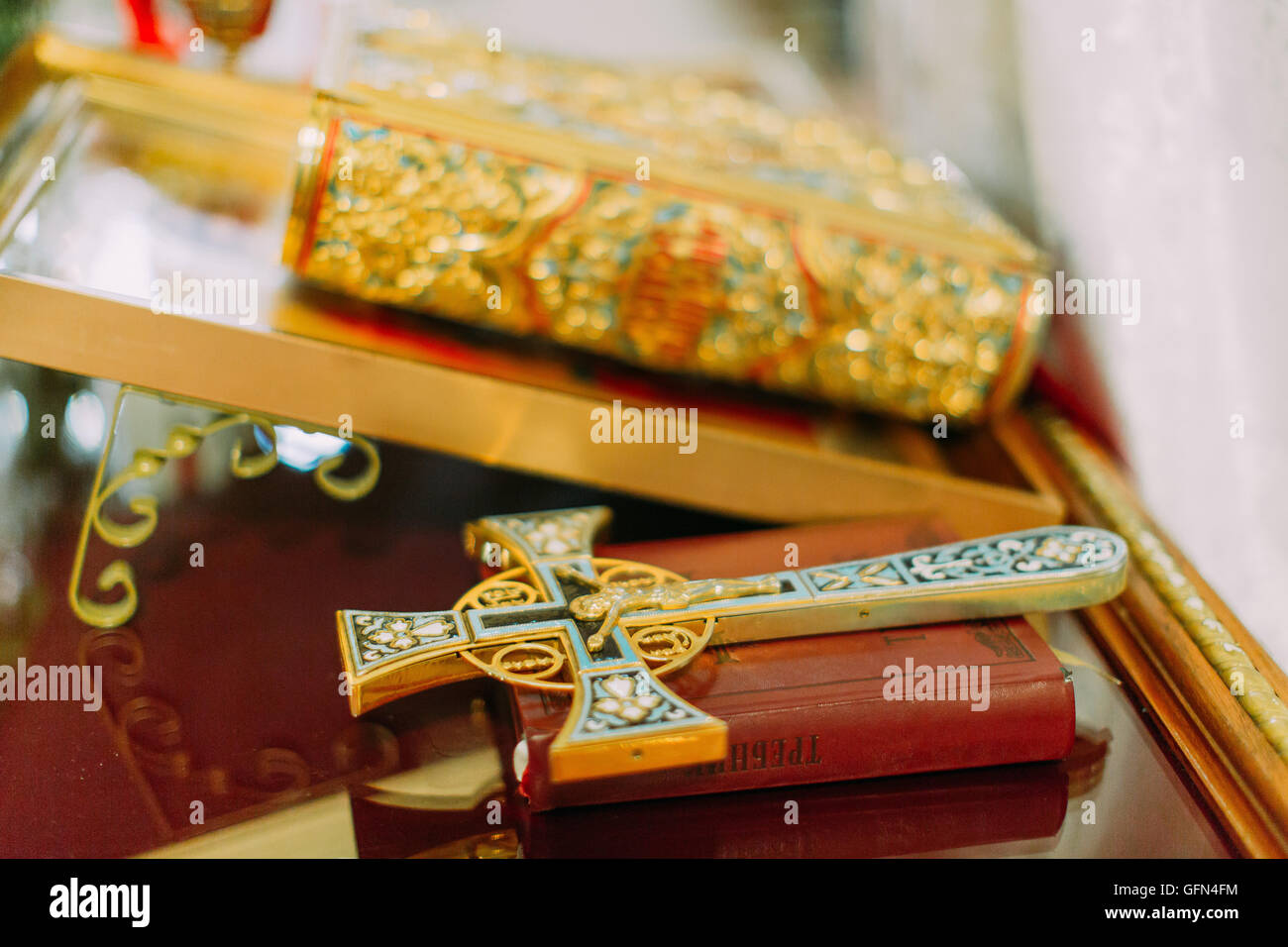 Orthodox Church wedding paraphernalia - cross and a bible on the altar ...