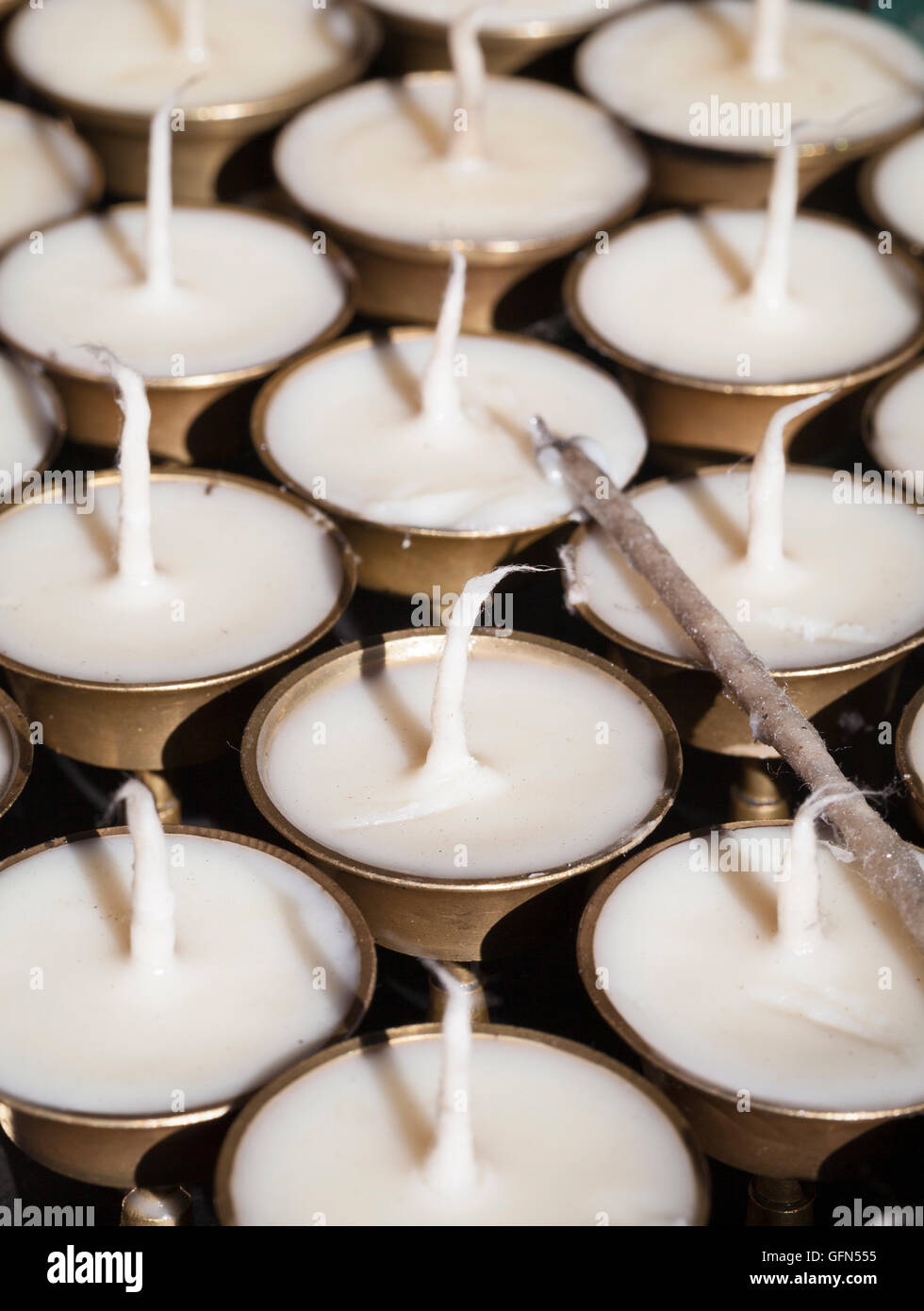 Stupa candles, Nepal Stock Photo - Alamy