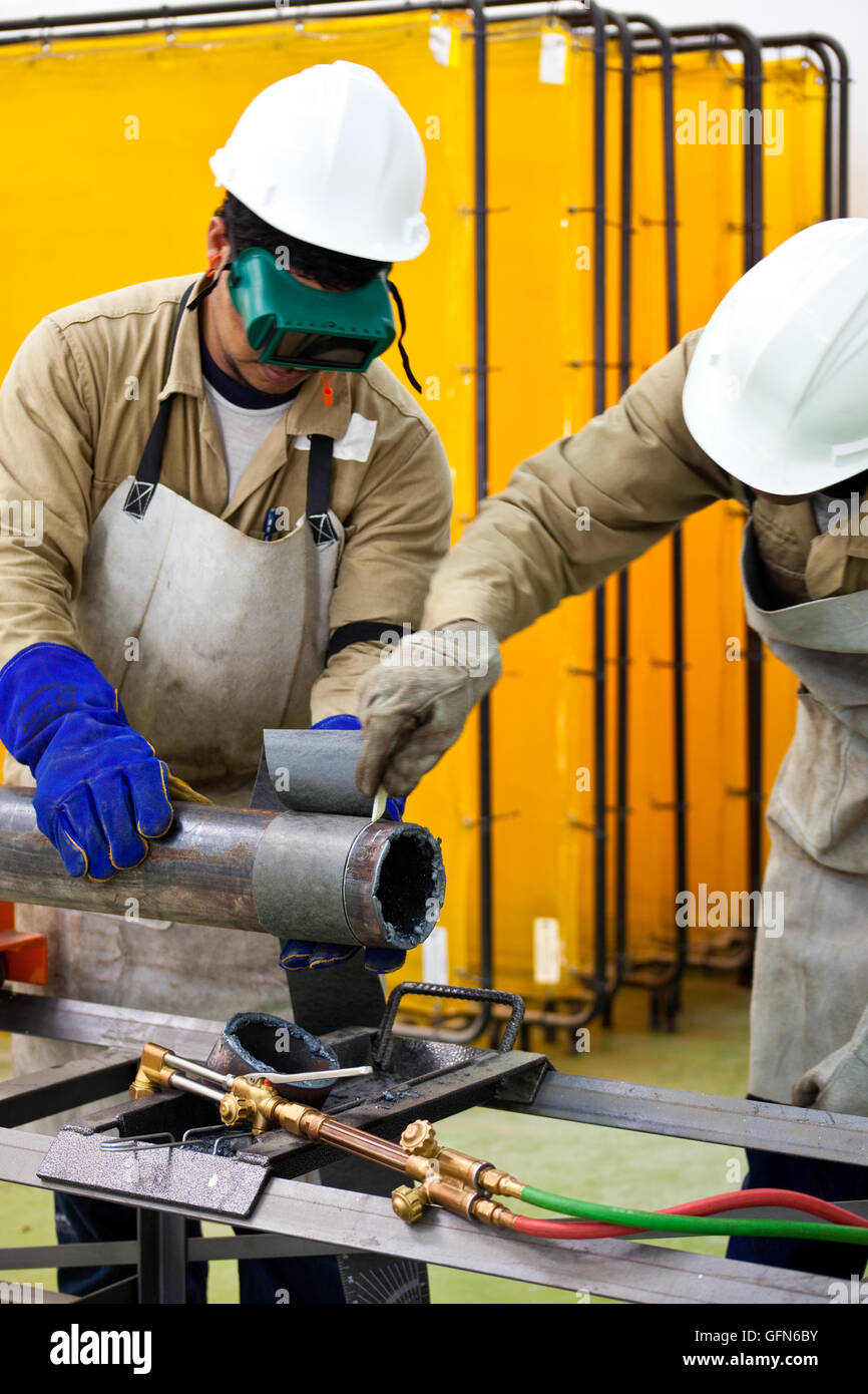 Cutting a tube hi-res stock photography and images - Alamy