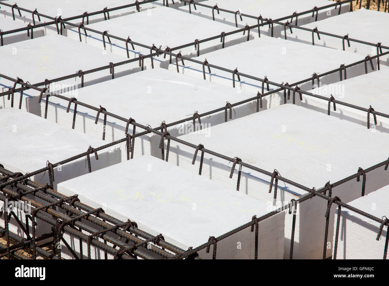 Iron framework and polyurethane to build a foundation for a building ...