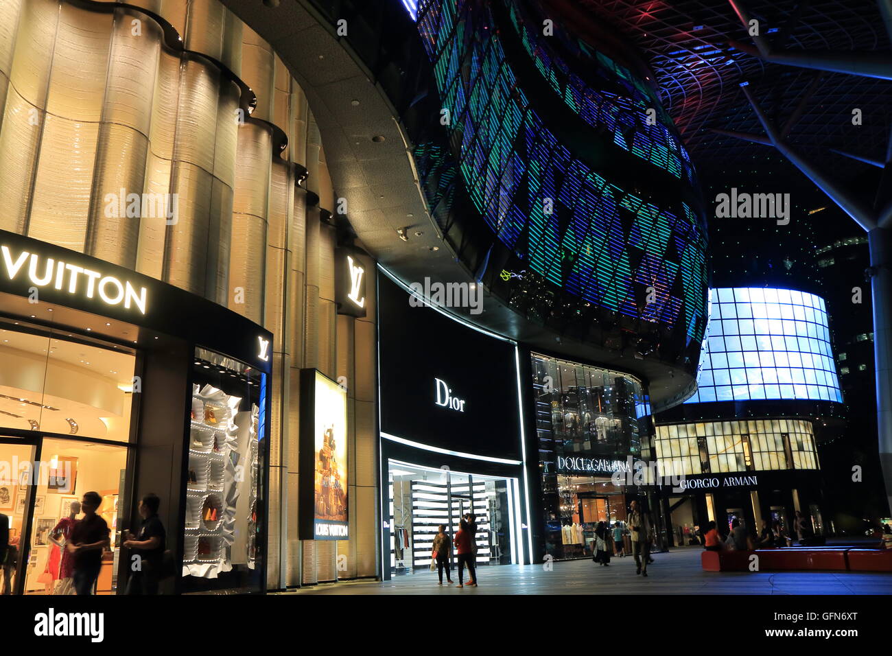 People shop at ION Orchard department store in Singapore Stock Photo ...