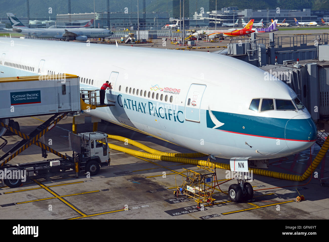 Cathay Pacific jet airplane at Hong Kong International airport, which ...