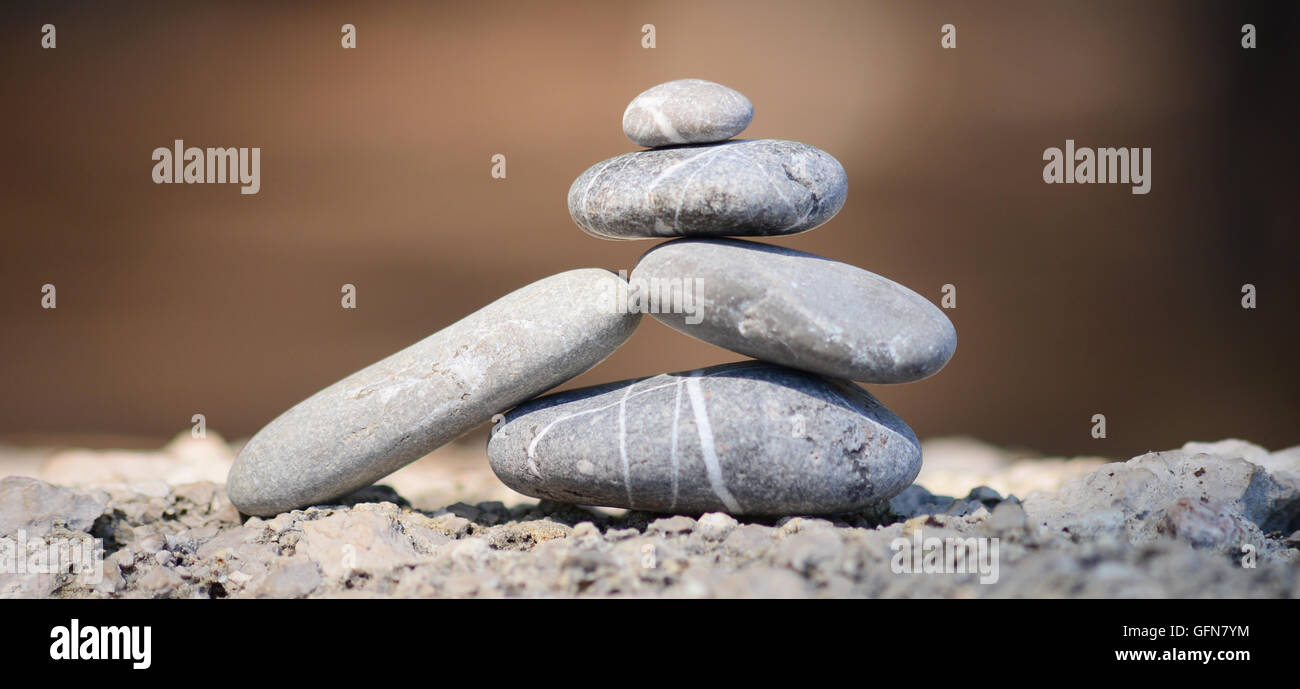 balancing stones with beautiful bokeh Stock Photo - Alamy
