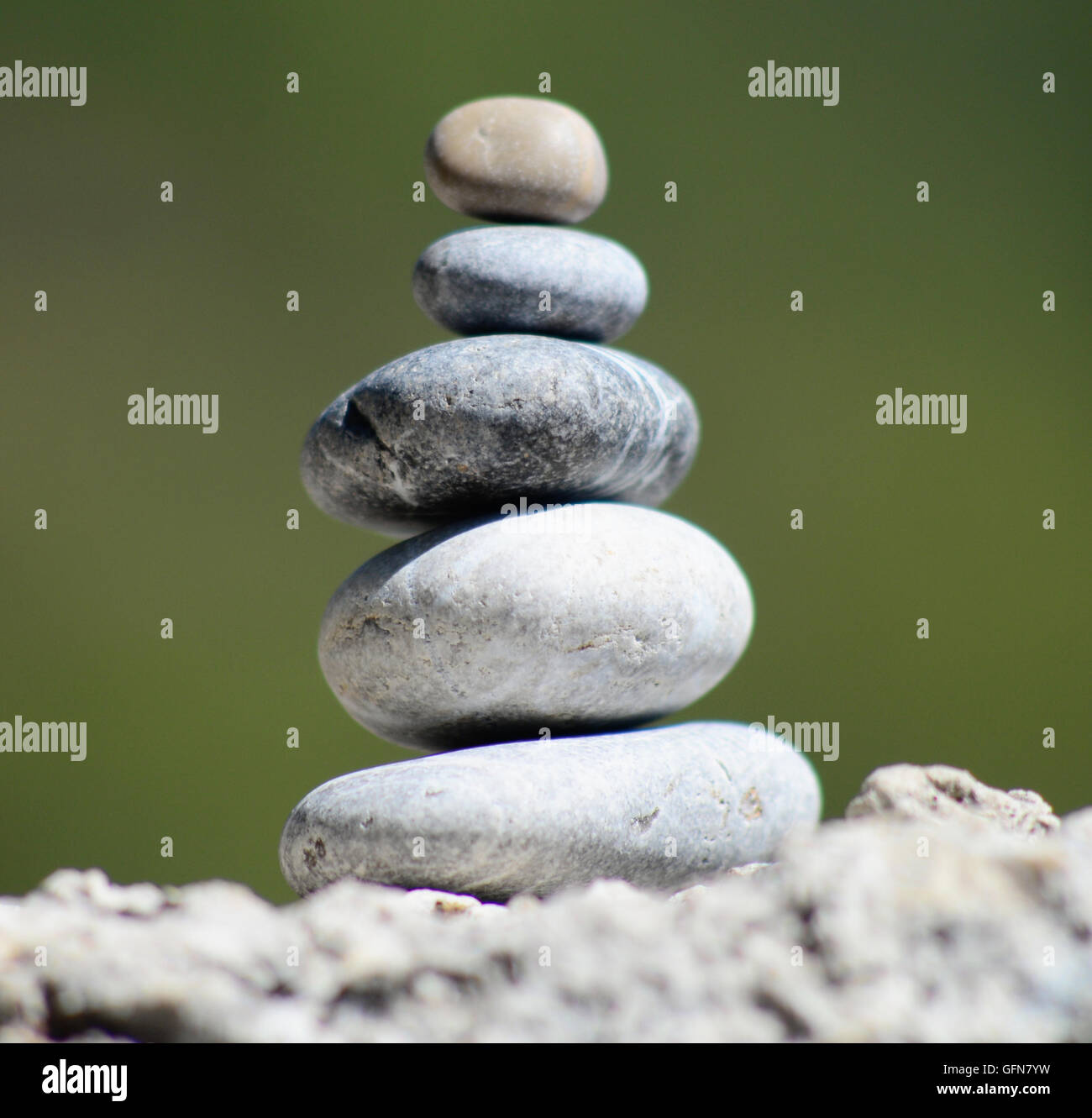 balancing stones with beautiful bokeh Stock Photo - Alamy