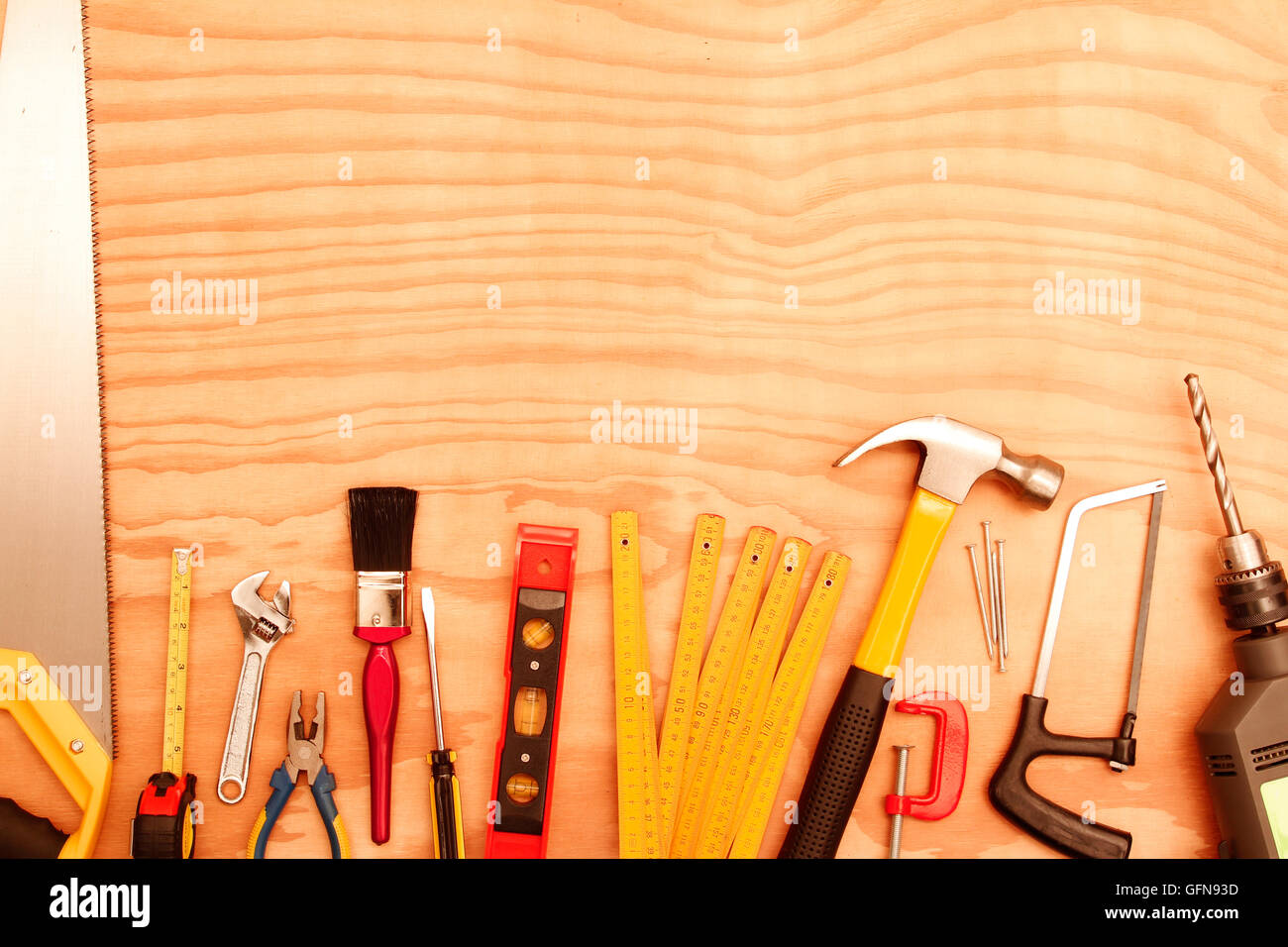 Assorted work tools on wood Stock Photo - Alamy