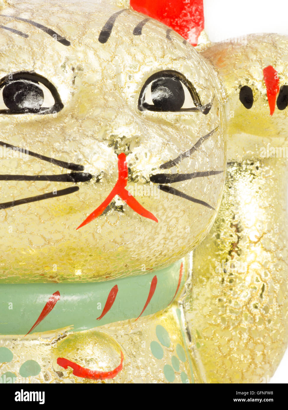 Gold Japanese beckoning cat called Manekineko on white isolated ...