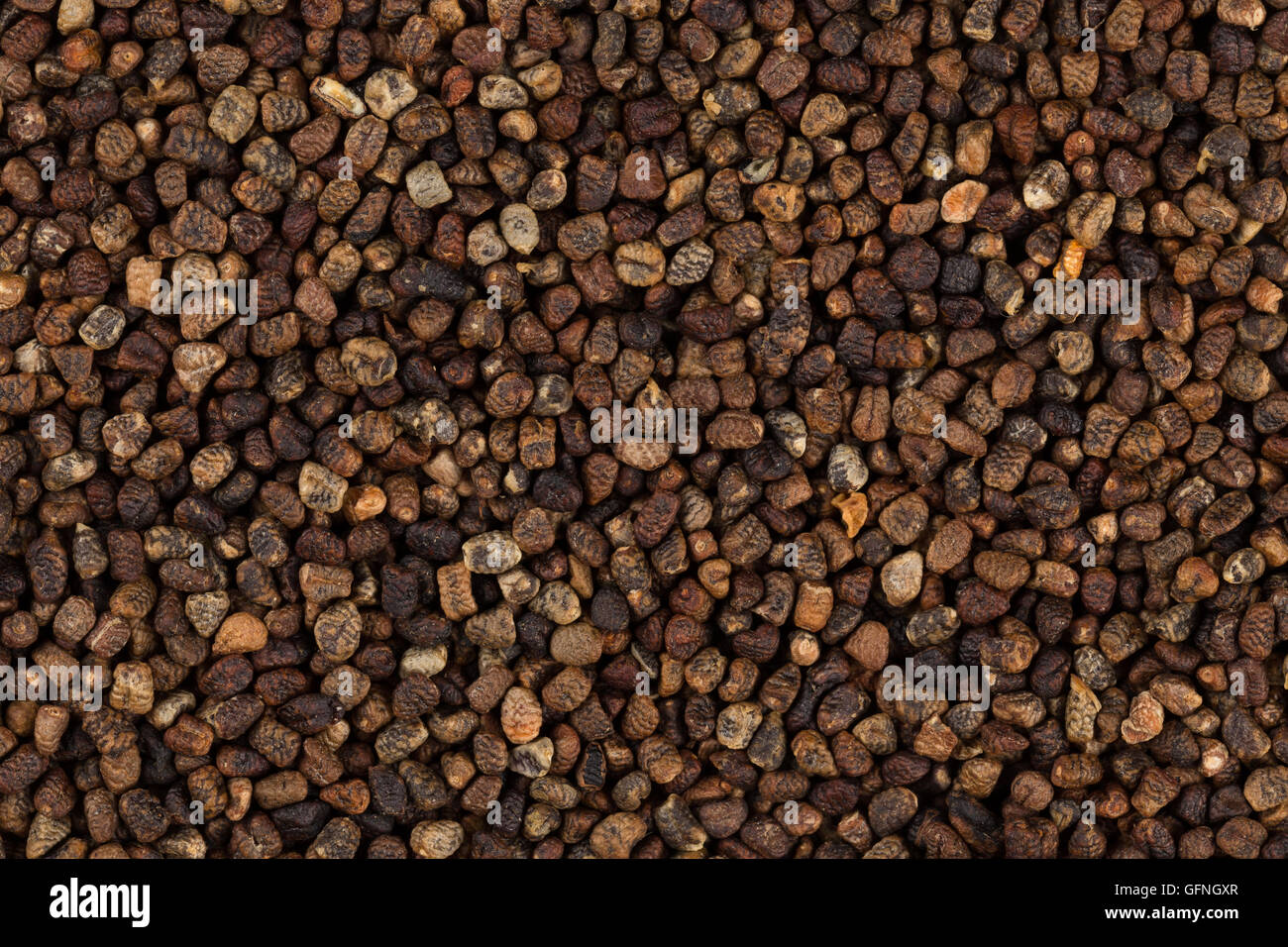 Decorticated cardamom seeds close up image can be used for background ...