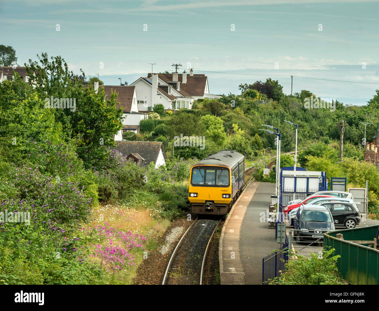 A First Great Western Train arrives at the pretty Lympstone Station ...