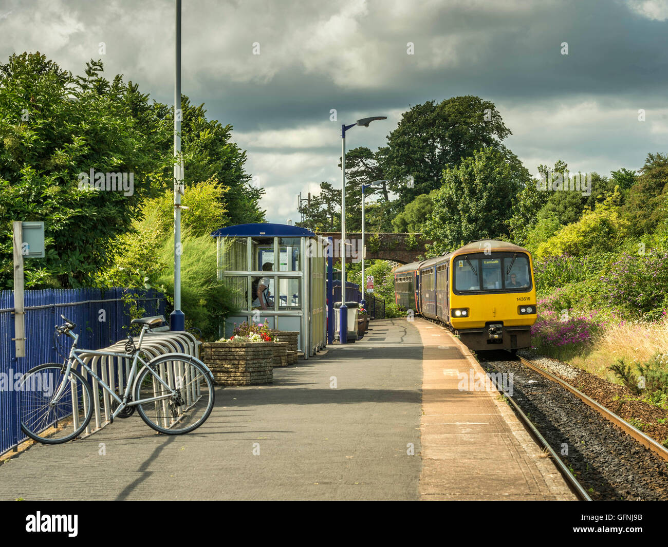 A First Great Western Train arrives at the pretty Lympstone Station ...