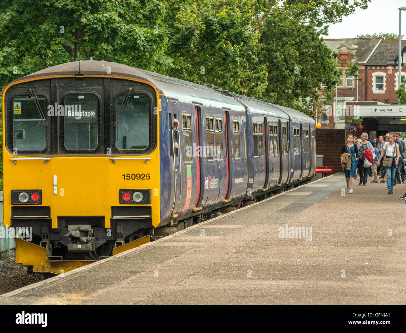 Passengers board train from platform hi-res stock photography and ...