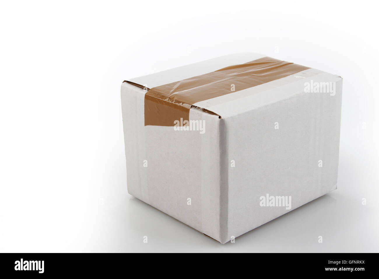 Closed cardboard box on plain background Stock Photo - Alamy