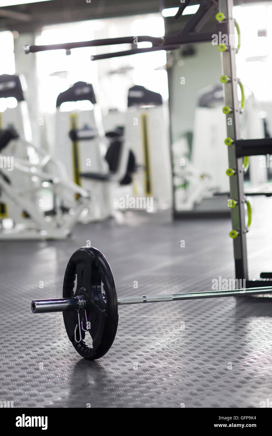 Exercise equipment in gym Stock Photo - Alamy