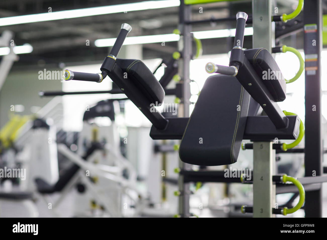 Exercise equipment in gym Stock Photo - Alamy