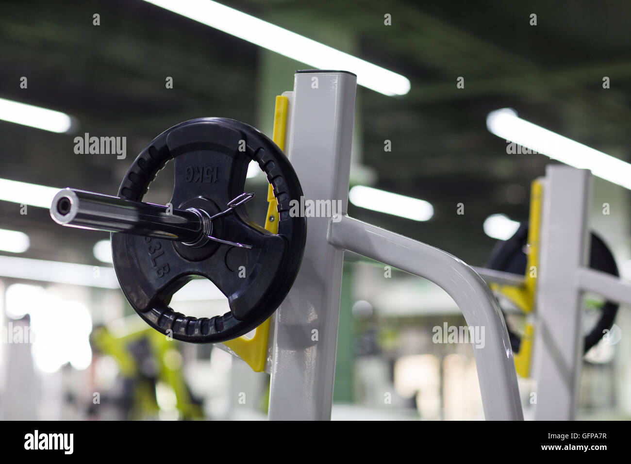 Exercise equipment in gym Stock Photo - Alamy
