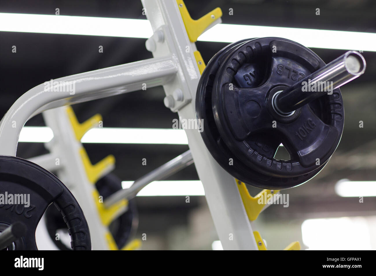 Exercise equipment in gym Stock Photo - Alamy