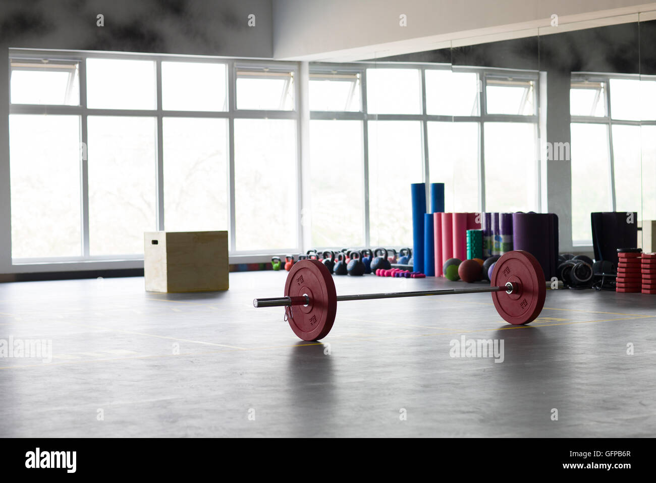 Exercise equipment in gym Stock Photo - Alamy