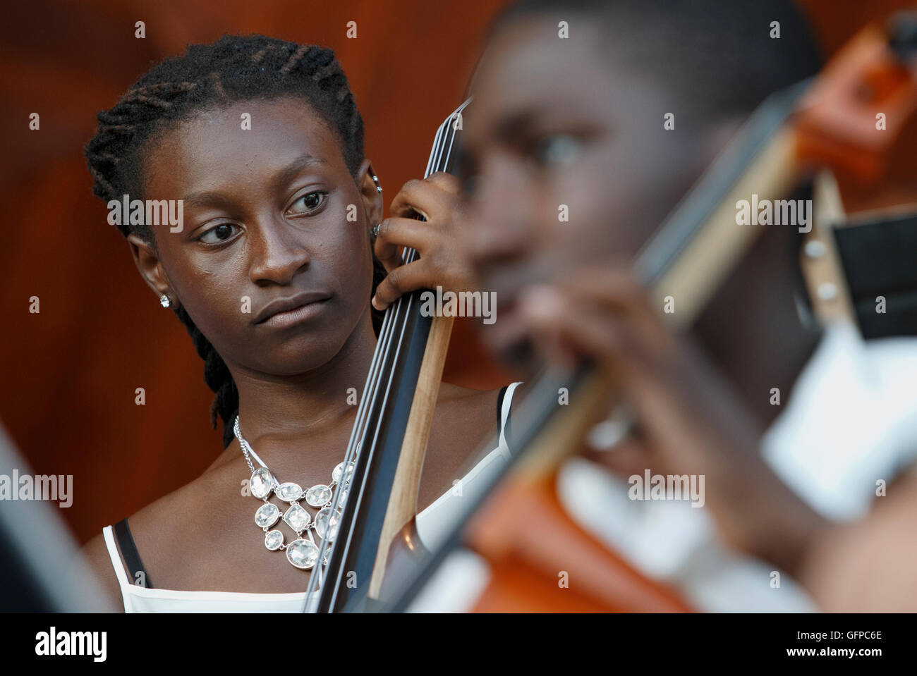 Young musicians playing with the Boston Landmarks Orchestra at the ...