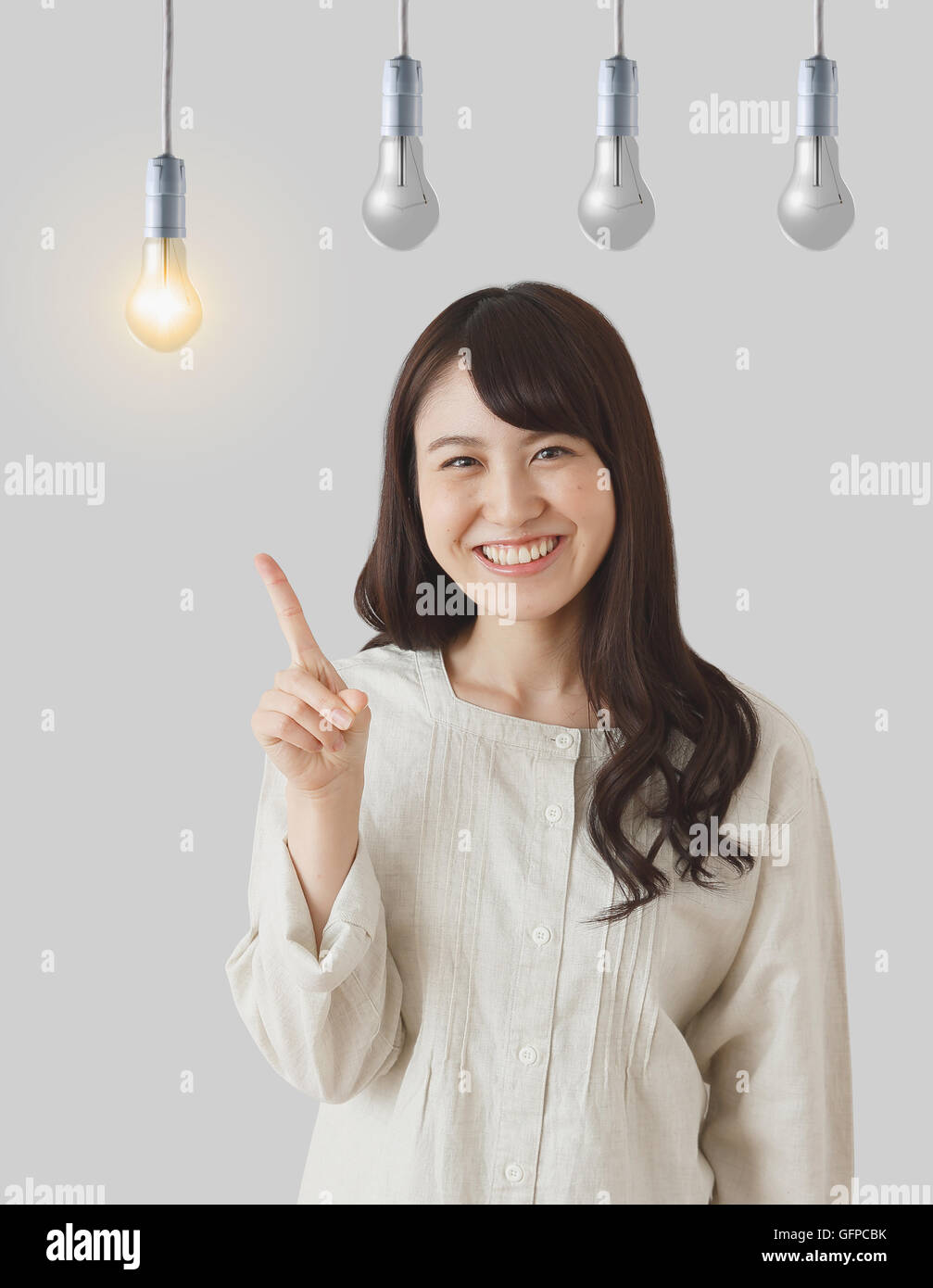 Japanese woman with light bulbs Stock Photo - Alamy