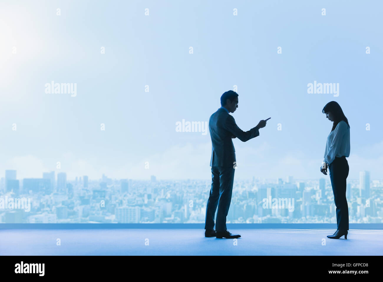 Businessman harrasing woman Stock Photo - Alamy