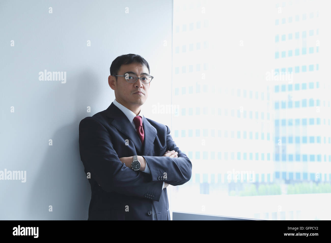 Japanese businessman in a modern office Stock Photo - Alamy