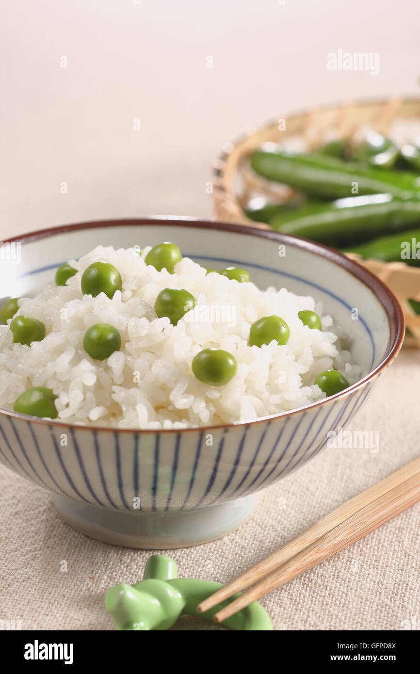 Green peas topped rice Stock Photo - Alamy