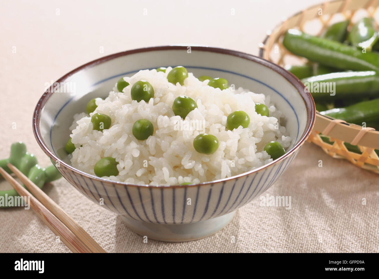Green peas topped rice Stock Photo - Alamy