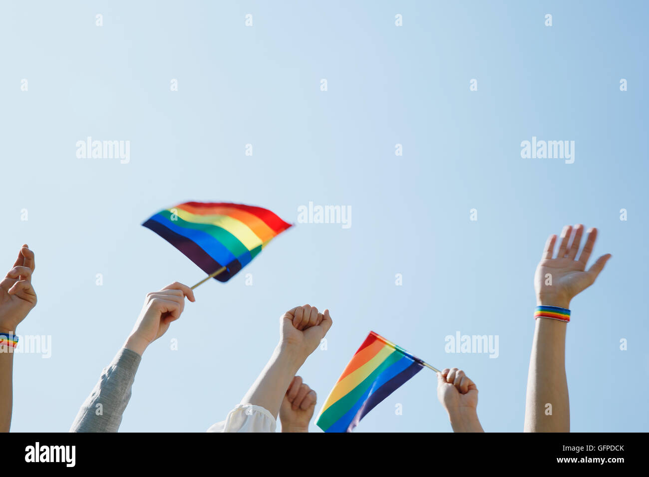 People with rainbow flags Stock Photo - Alamy