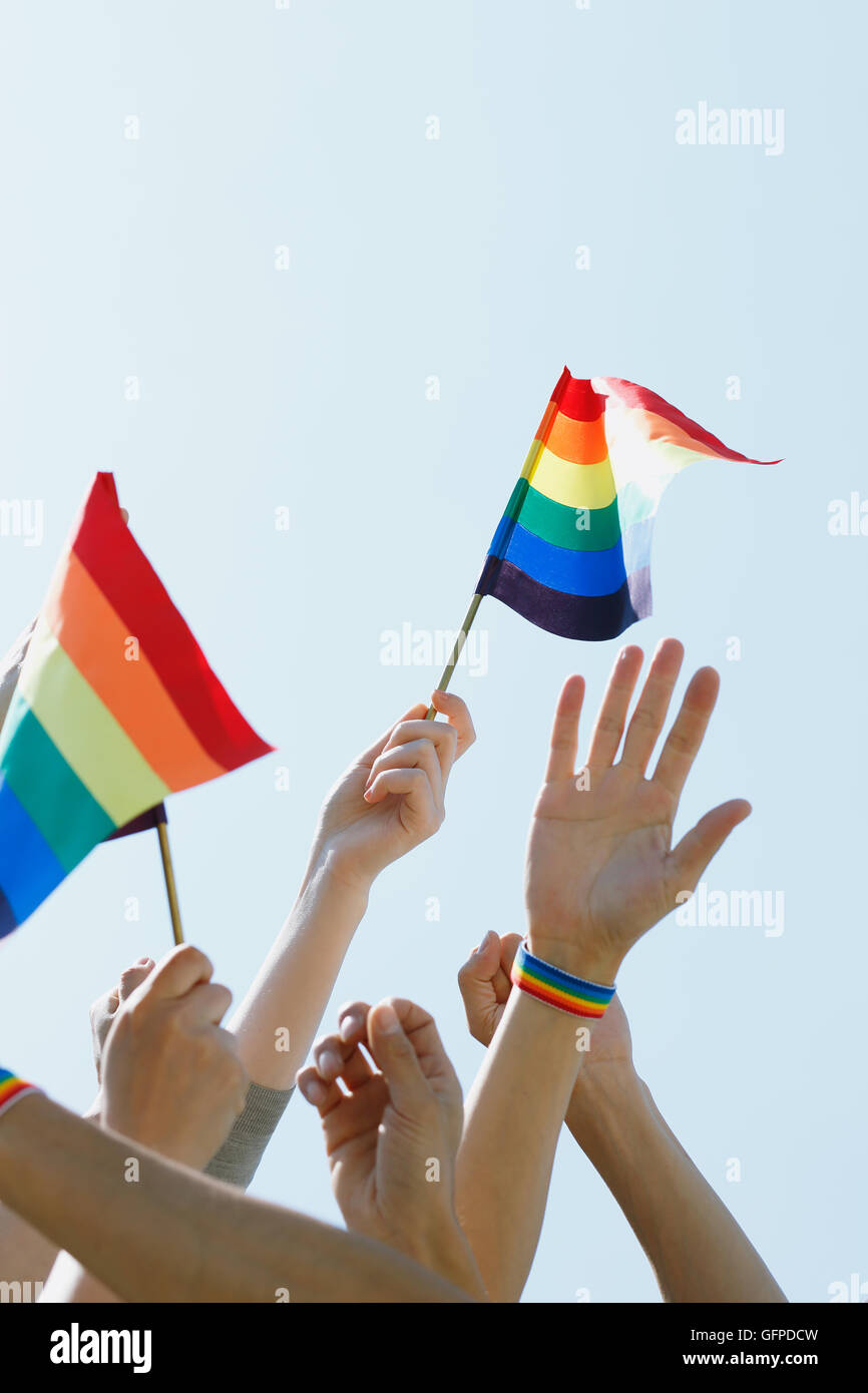 People with rainbow flags Stock Photo - Alamy