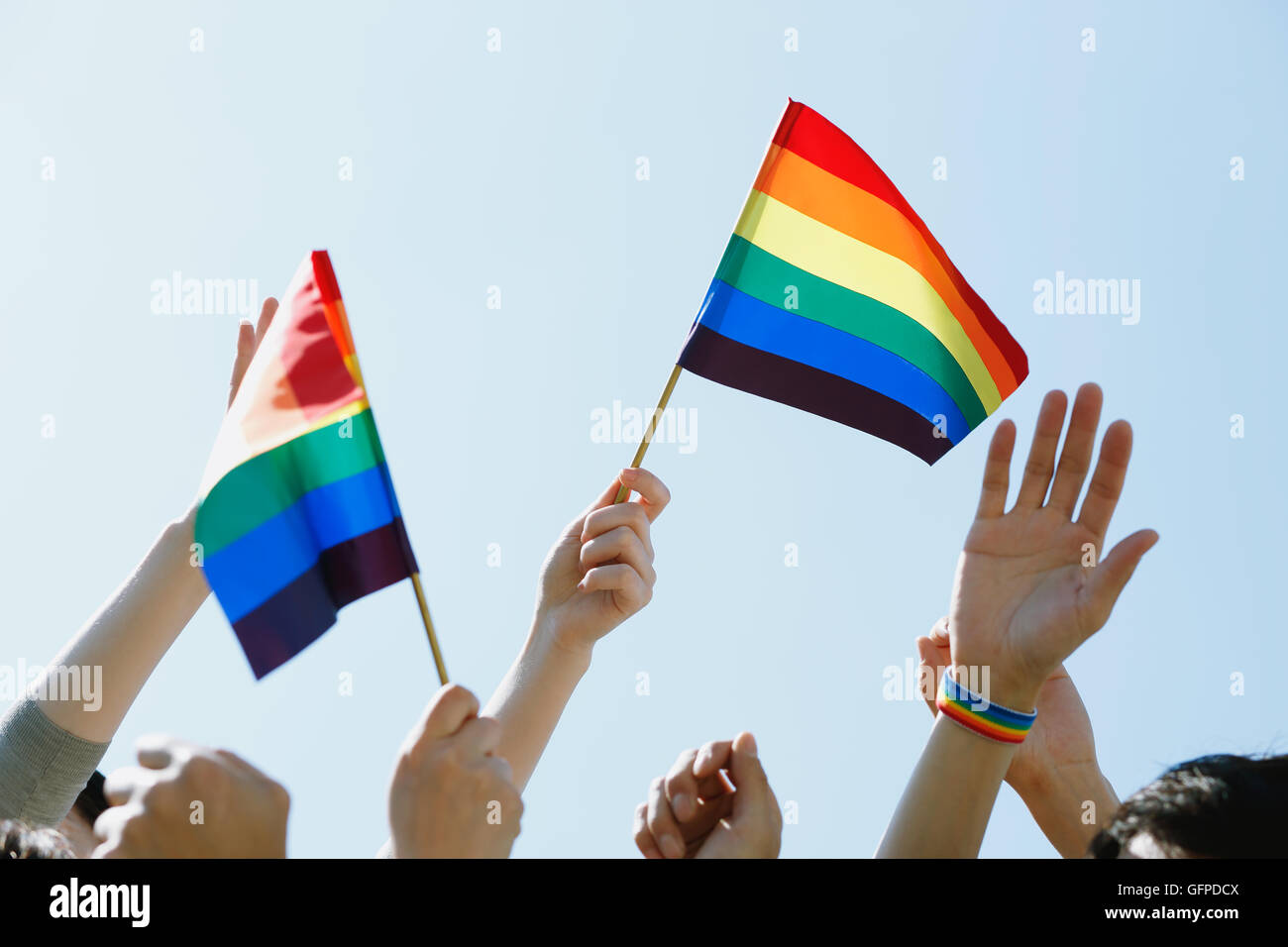 People with rainbow flags Stock Photo - Alamy