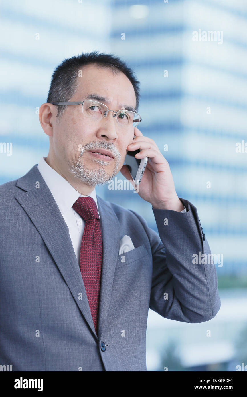 Japanese businessman in a modern office Stock Photo - Alamy