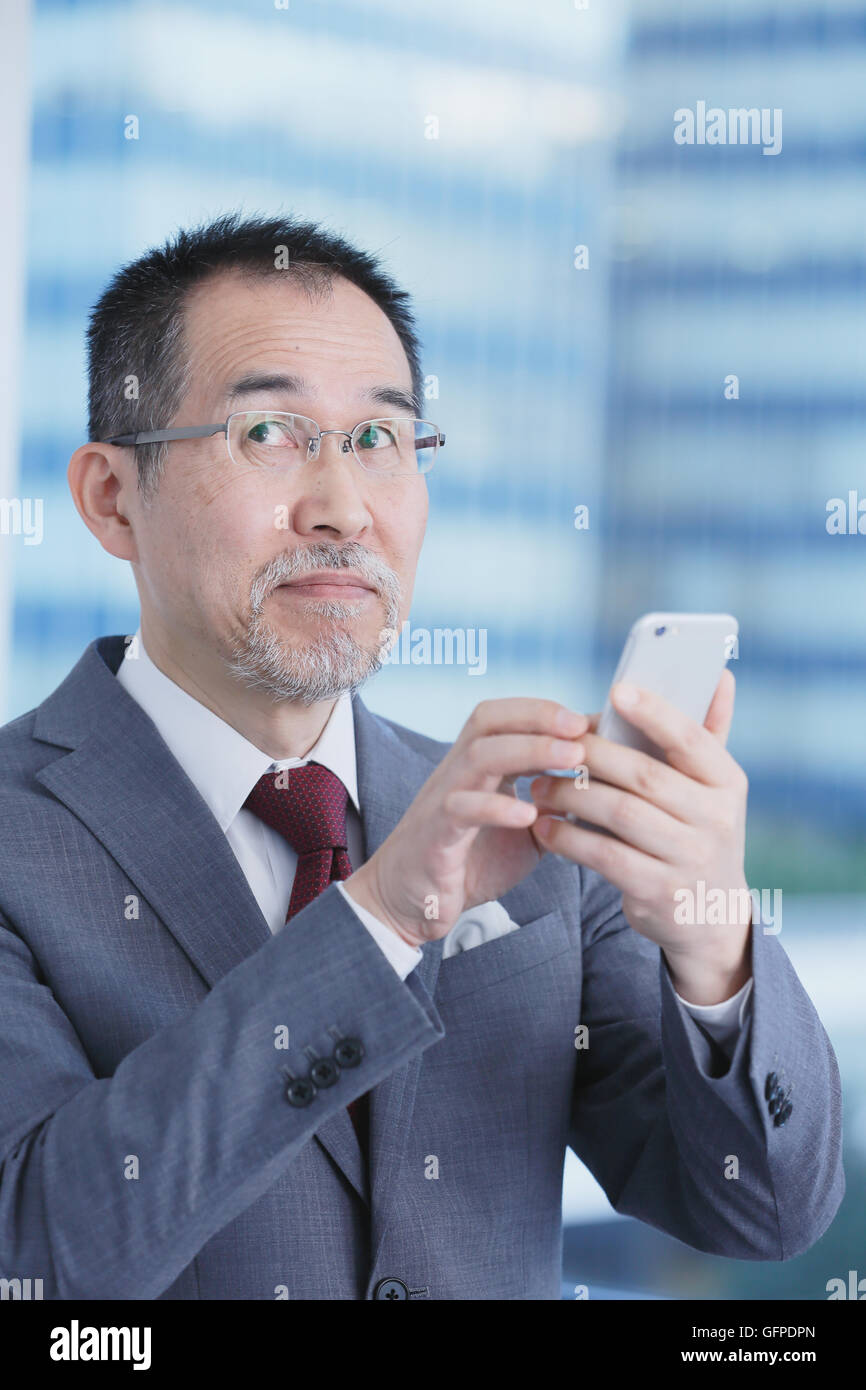 Japanese businessman in a modern office Stock Photo - Alamy