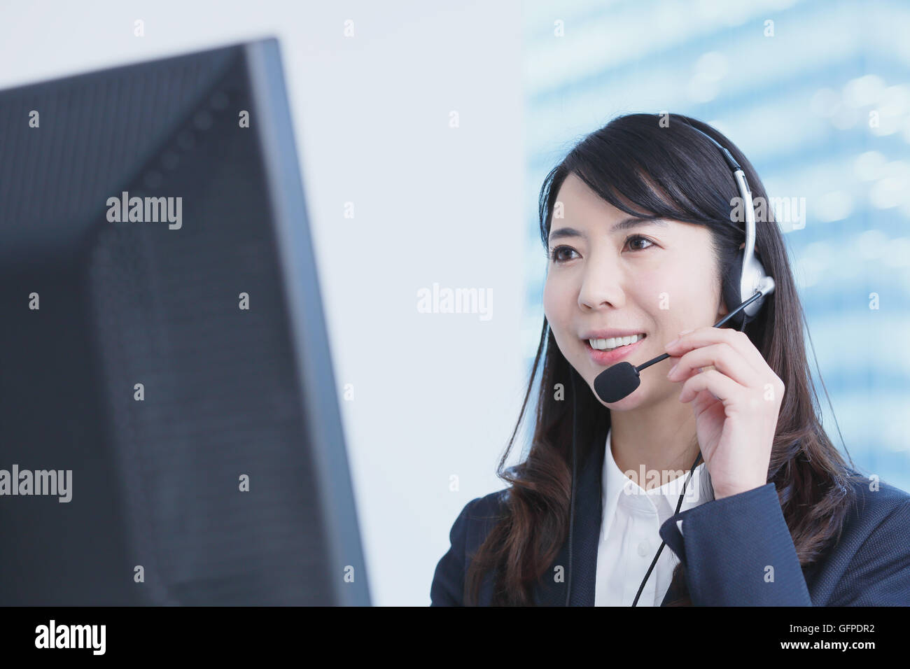 Japanese call center operator Stock Photo - Alamy