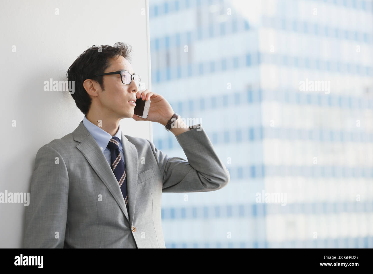 Japanese businessman in a modern office Stock Photo - Alamy