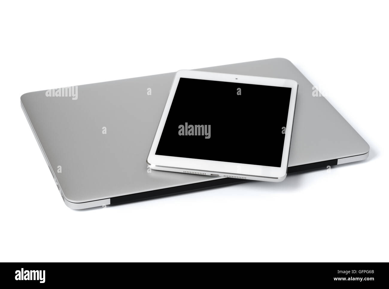 Tablet laptop on desk Cut Out Stock Images & Pictures - Alamy