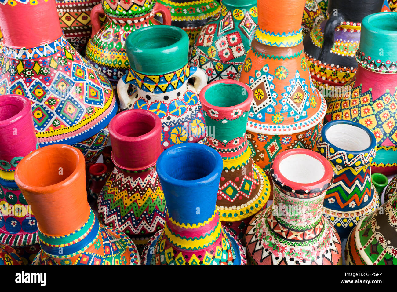 Angled view showing a composition of artistic painted handcrafted ...