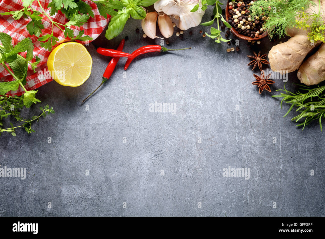 Fresh herbs on stone background Stock Photo - Alamy