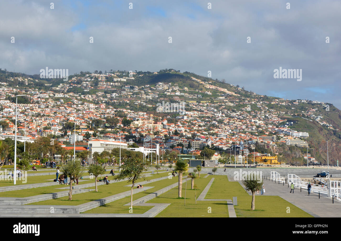 Seafront promenade with people walking and sitting at Funchal, Madeira ...