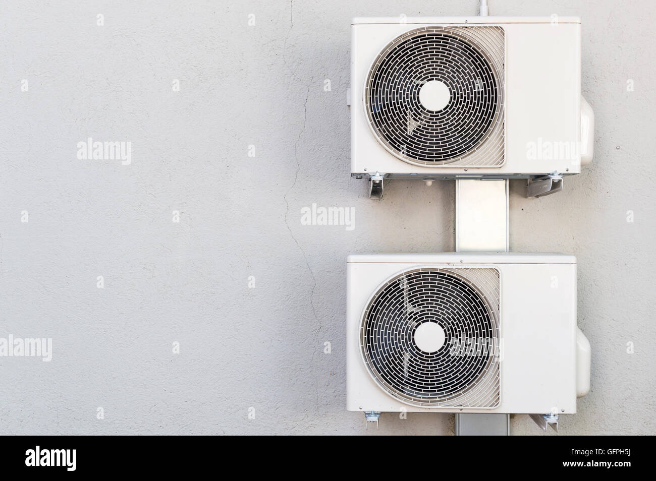 Two compressors for air conditioners. Installed on the wall.Copy space ...
