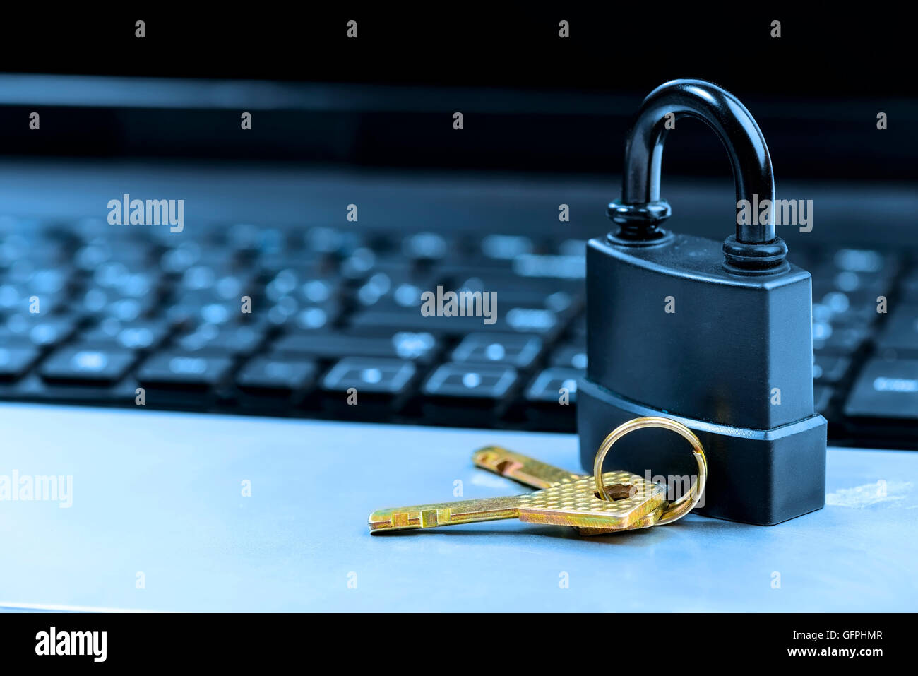 Lock on laptop keyboard with shallow depth of field toned in blue Stock ...