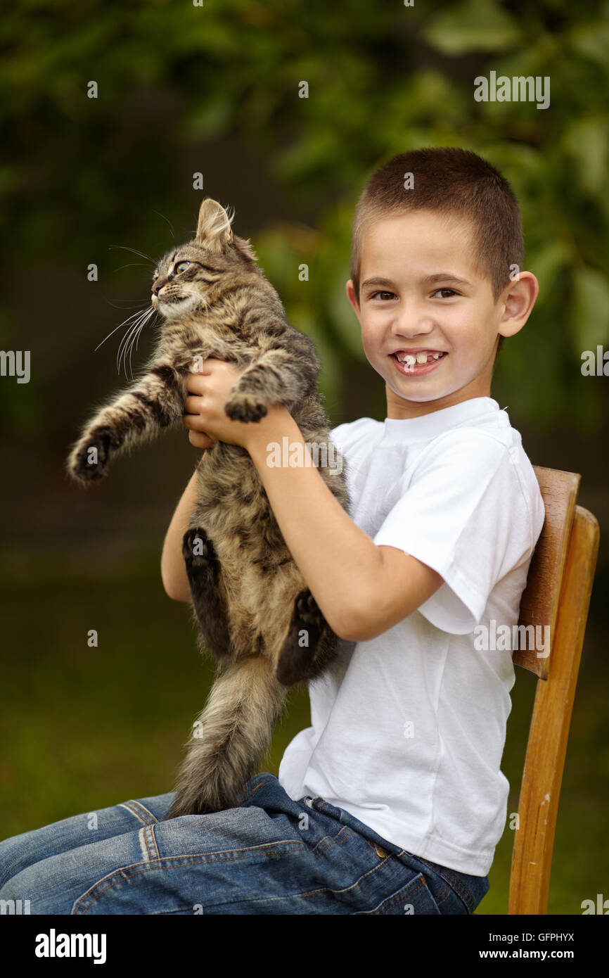 funny boy with cat Stock Photo - Alamy