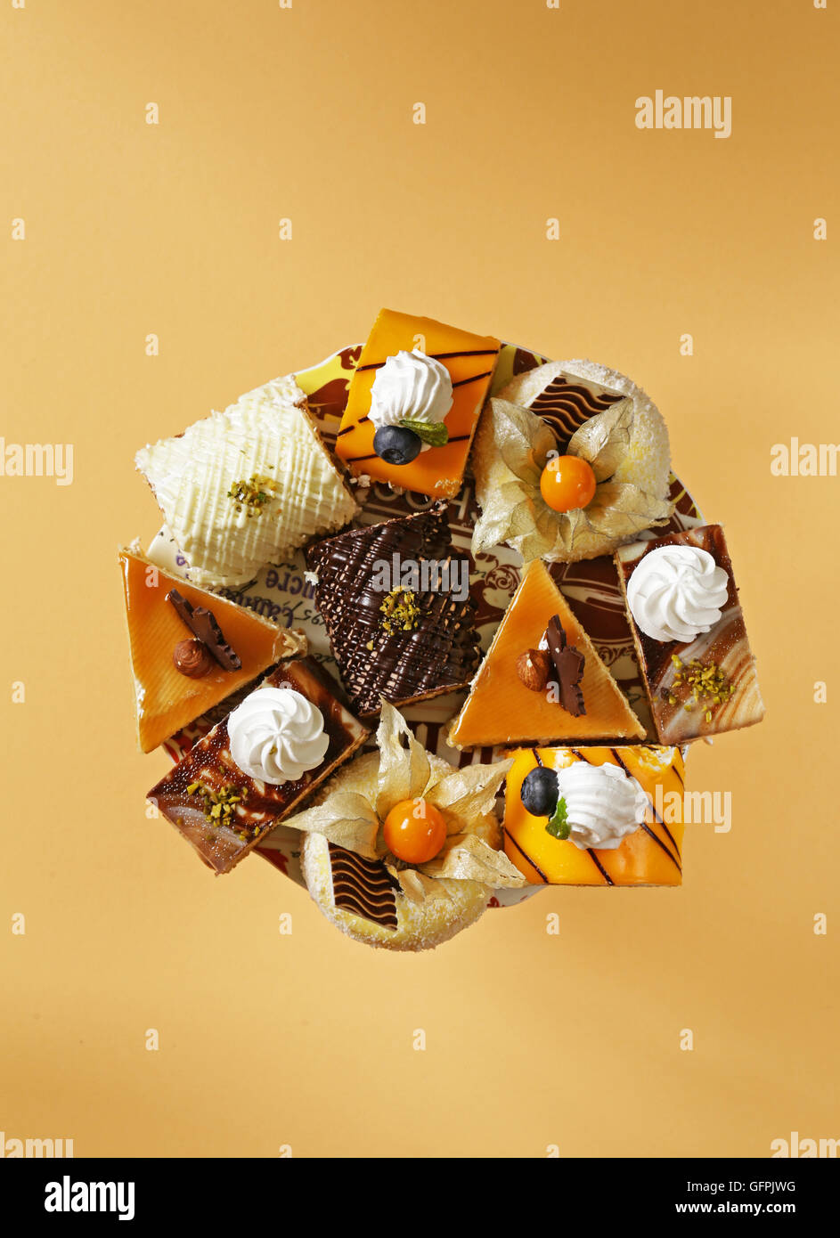 Assorted mini cakes different cream hi-res stock photography and images ...