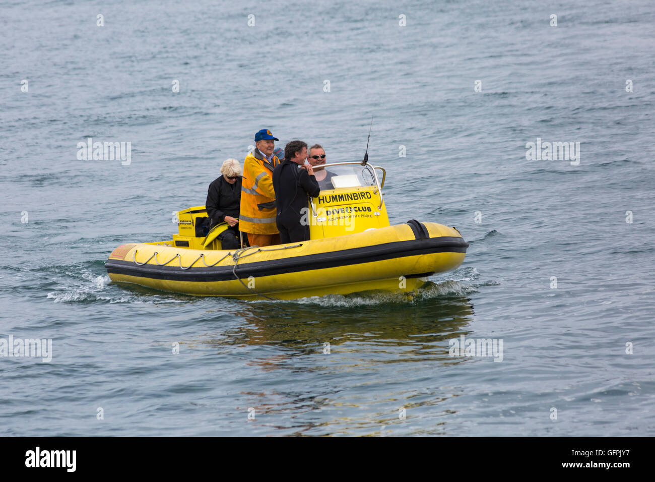 People riding in Humminbird Bournemouth & Poole Dive Club inflatable ...